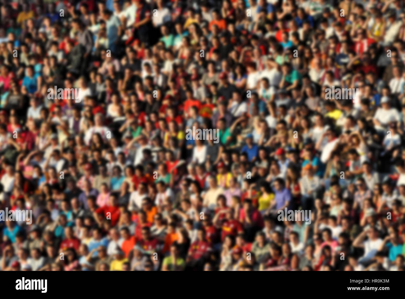 Crowd in a stadium. Blurred heads and faces of spectators Stock Photo ...