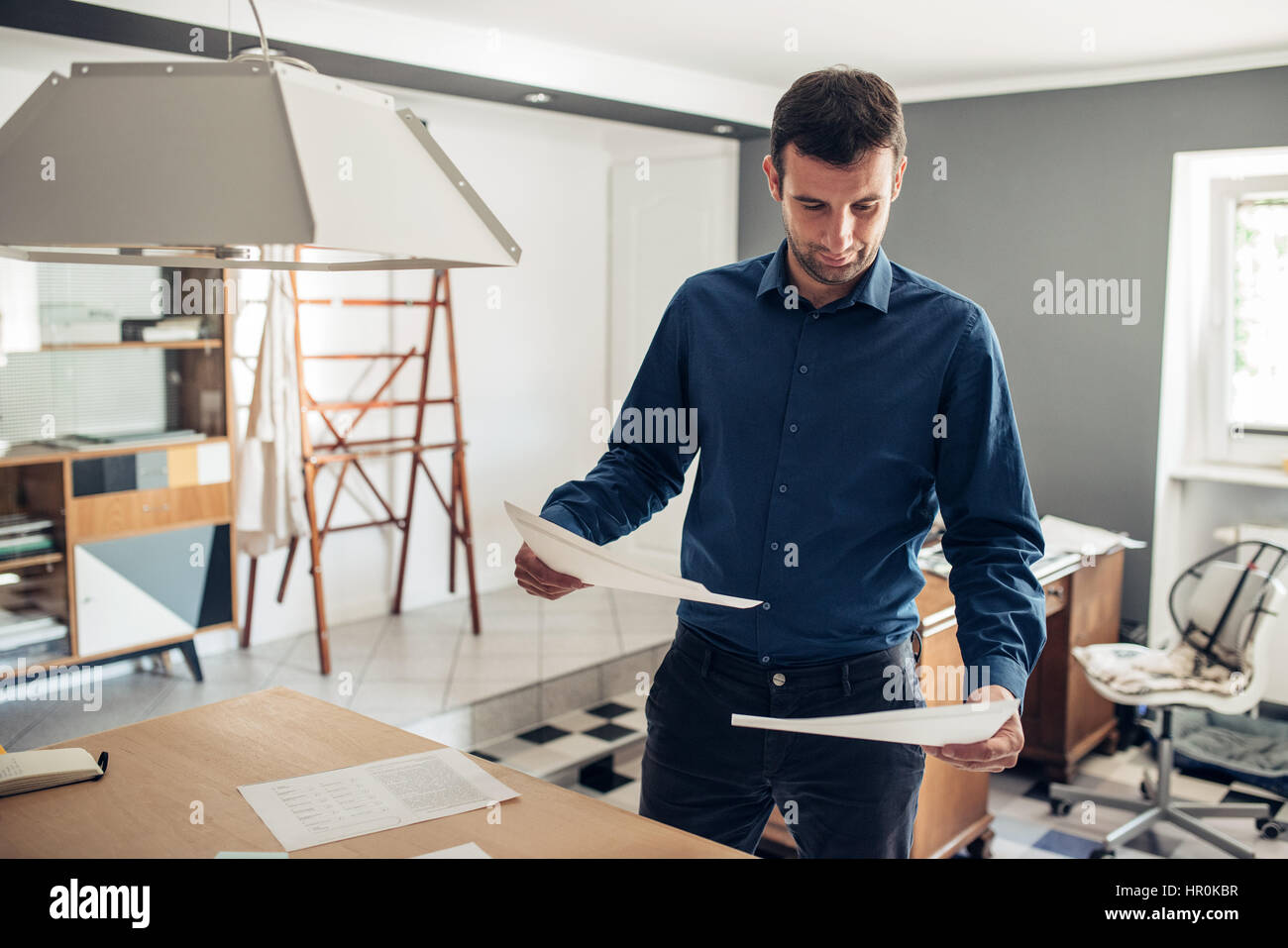 Going through paperwork hi-res stock photography and images - Alamy