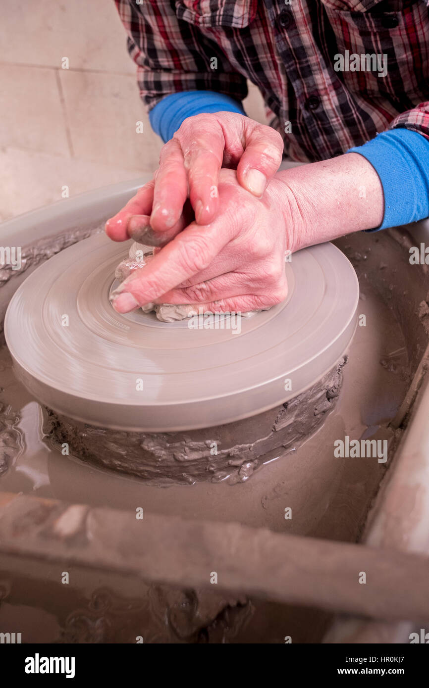 Potter making clay pots in the High street Dorchester Dorset Stock ...