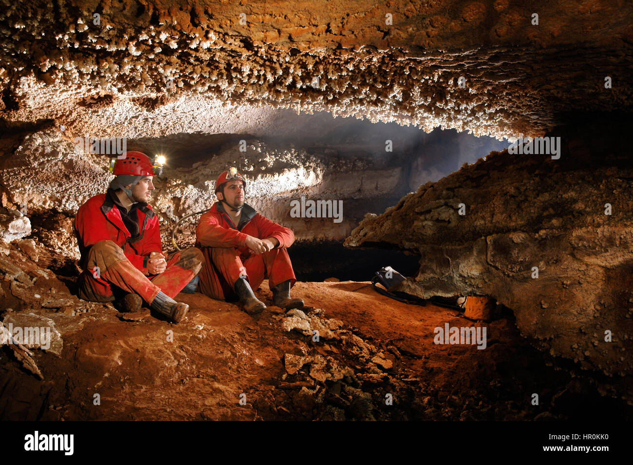 Cavers exploring a beautiful cave Stock Photo - Alamy