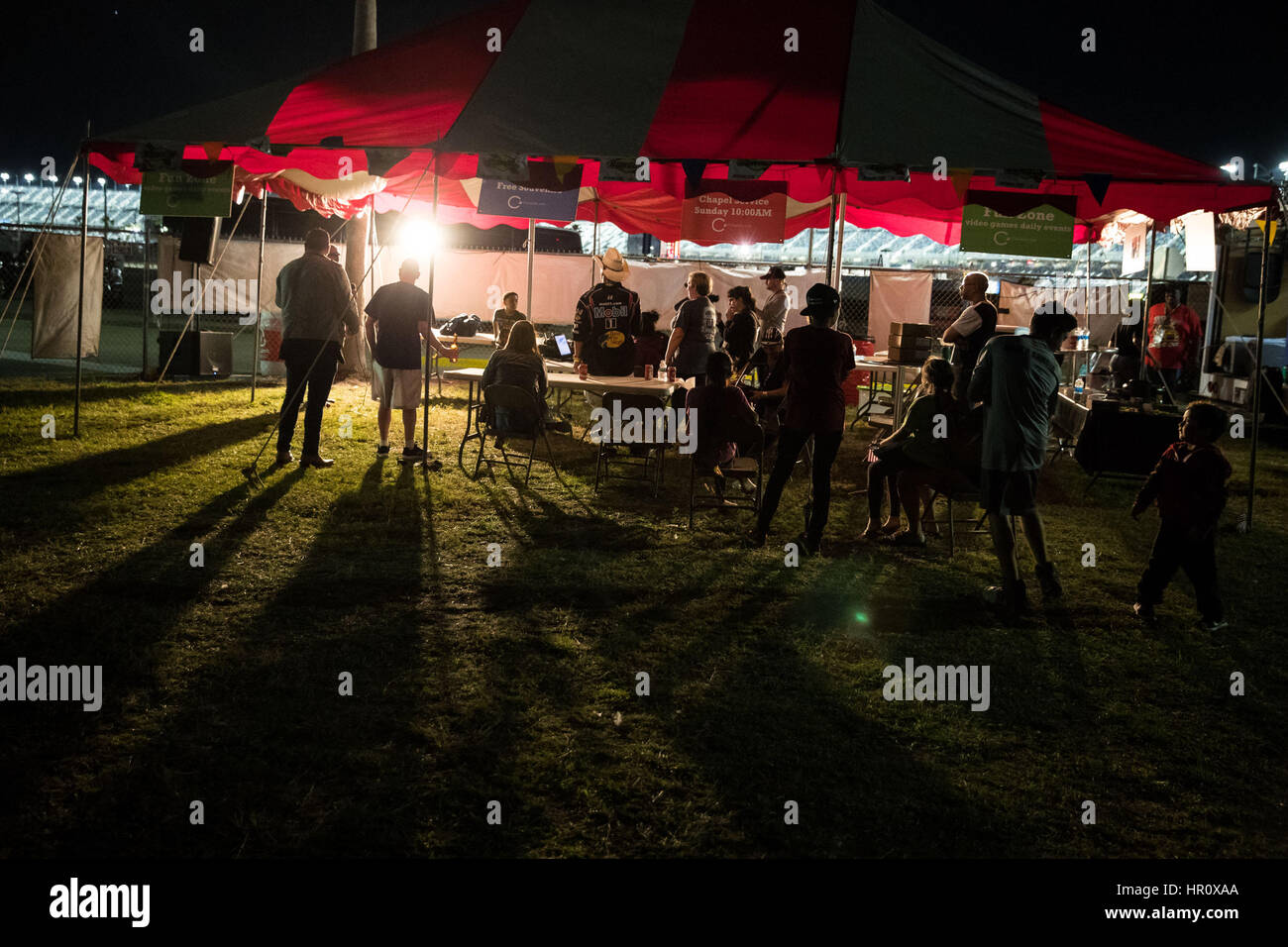 Florida, USA. 25th Feb, 2017. A karaoke tent attracts a crowd on the ...