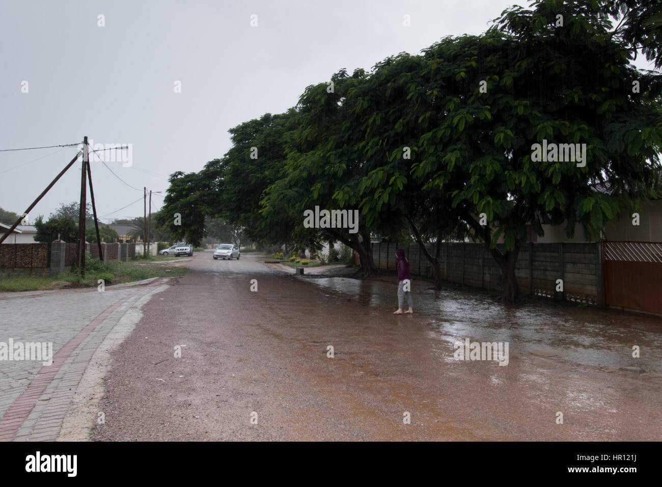 Gaborone, Botswana. 25 February, 2017. Woman negotiates surface ...