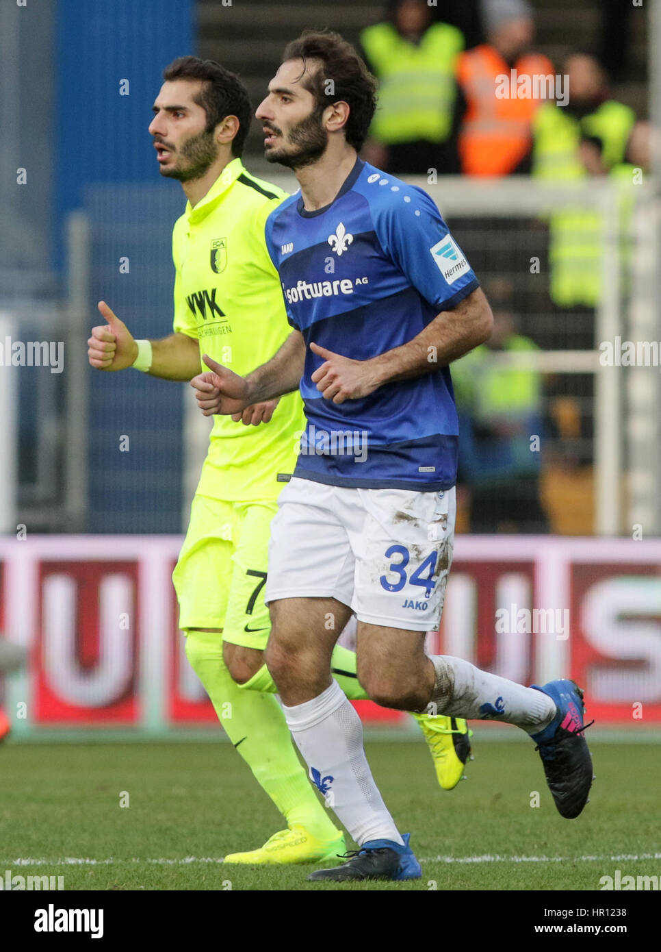 Darmstadt, Germany. 25th Feb, 2017. Augsburg's Halil Altintop (l) and ...