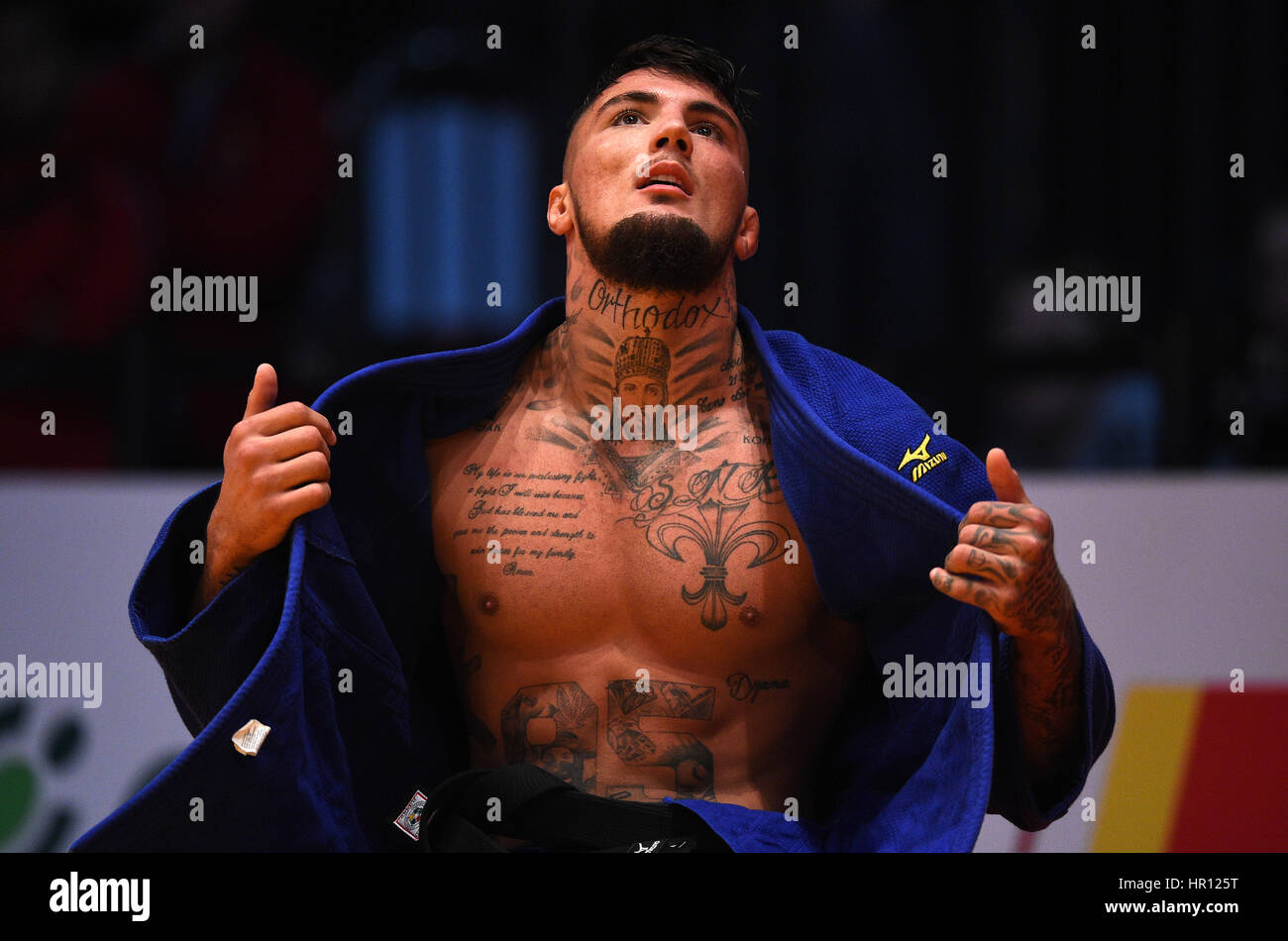 Duesseldorf, Germany. 26th Feb, 2017. David Tekic (blue, Germany ...