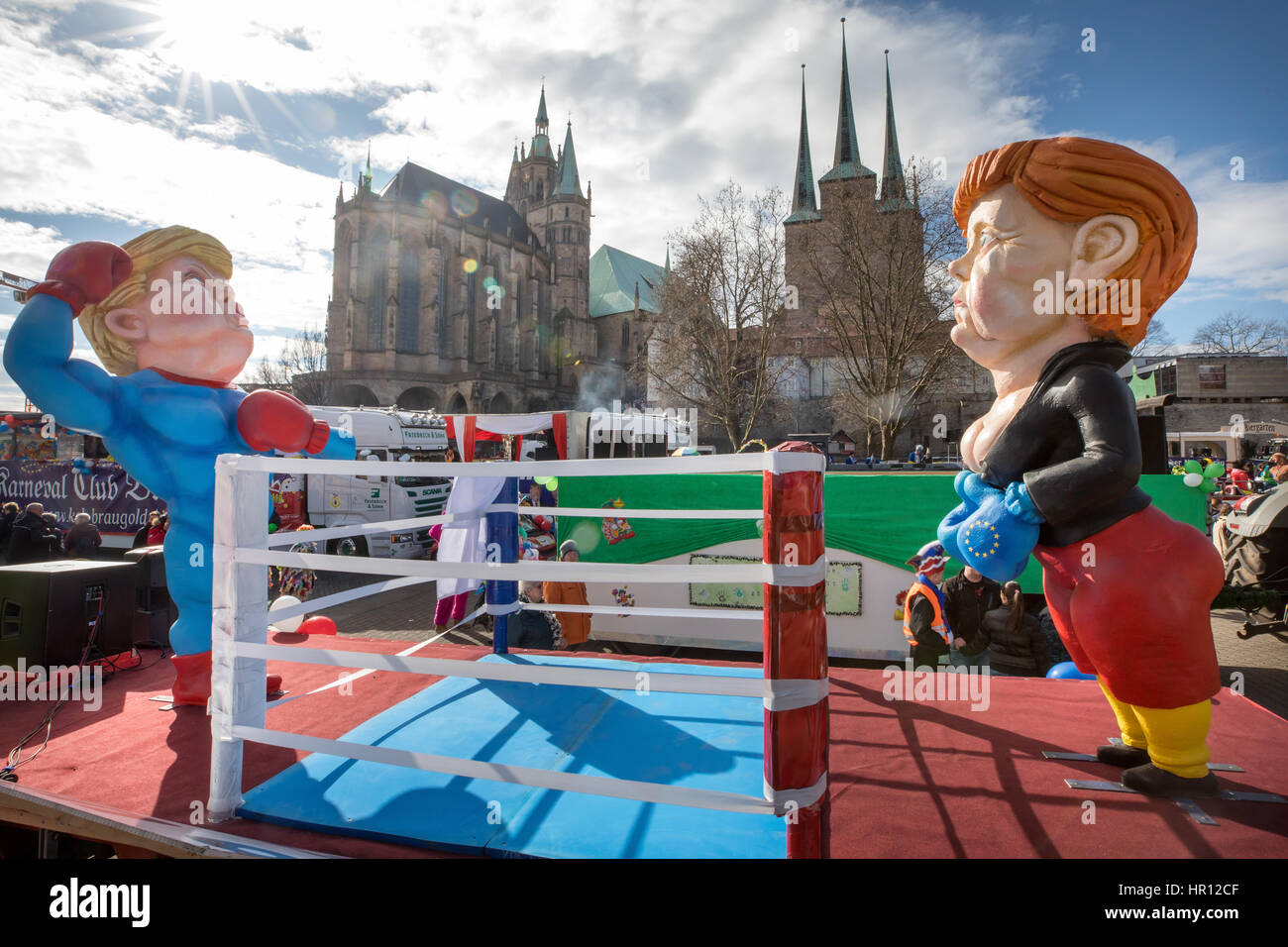 Figures representing Angela Merkel and Donald Trump in a boxing ring ...
