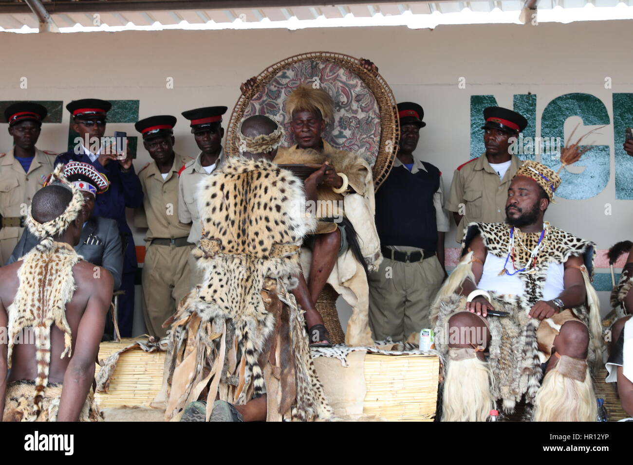 Chipata, Zambia. 25th Feb, 2017. The paramount chief (back, C) drinks ...