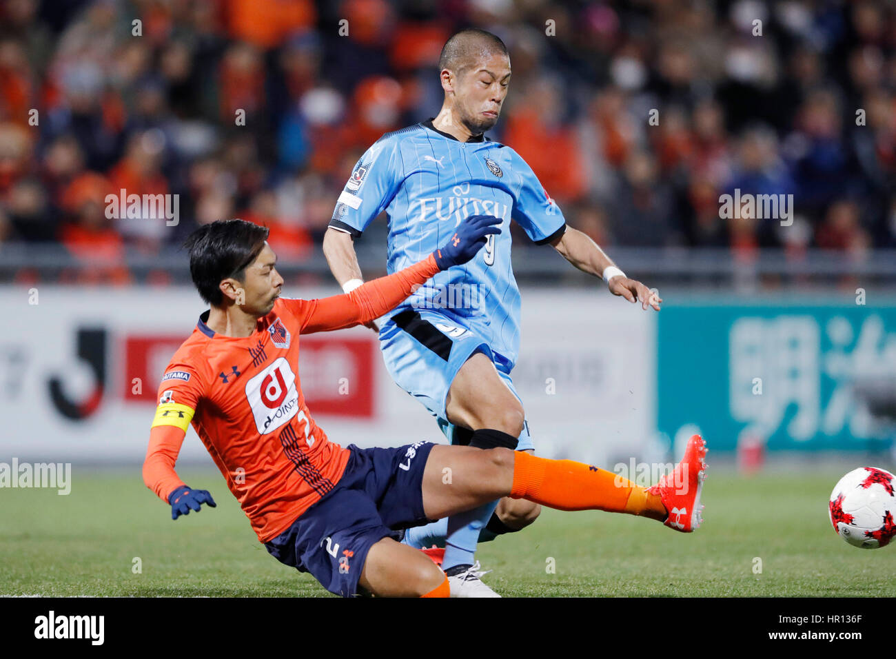 Saitama, Japan. 25th Feb, 2017. (L-R) Kosuke Kikuchi (Ardija), Takayuki Morimoto (Frontale ...