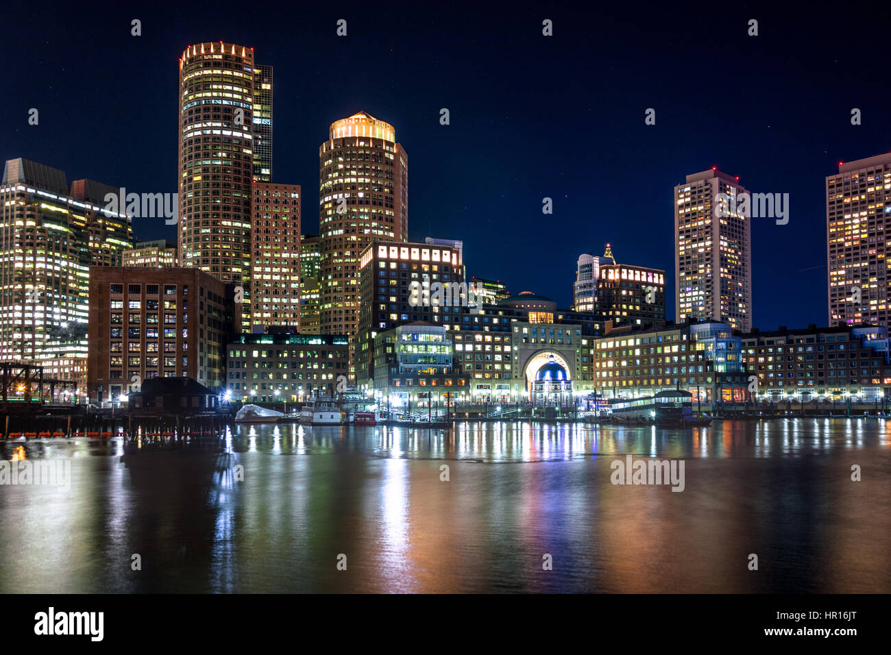 Boston Harbor and Financial District skyline at night - Boston ...