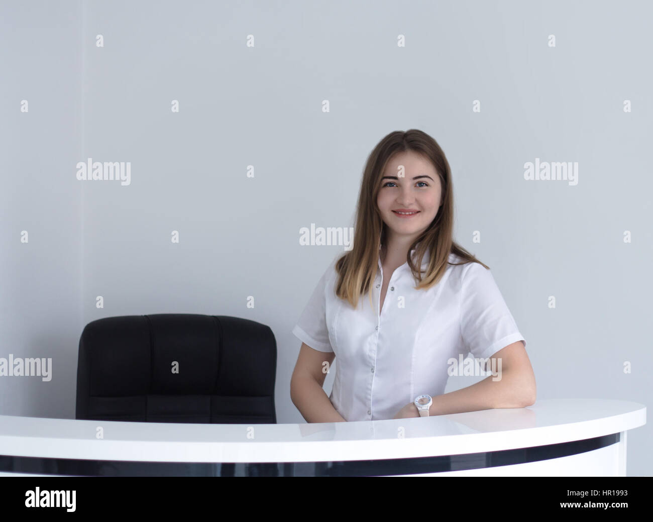 Female receptionist hi-res stock photography and images - Alamy