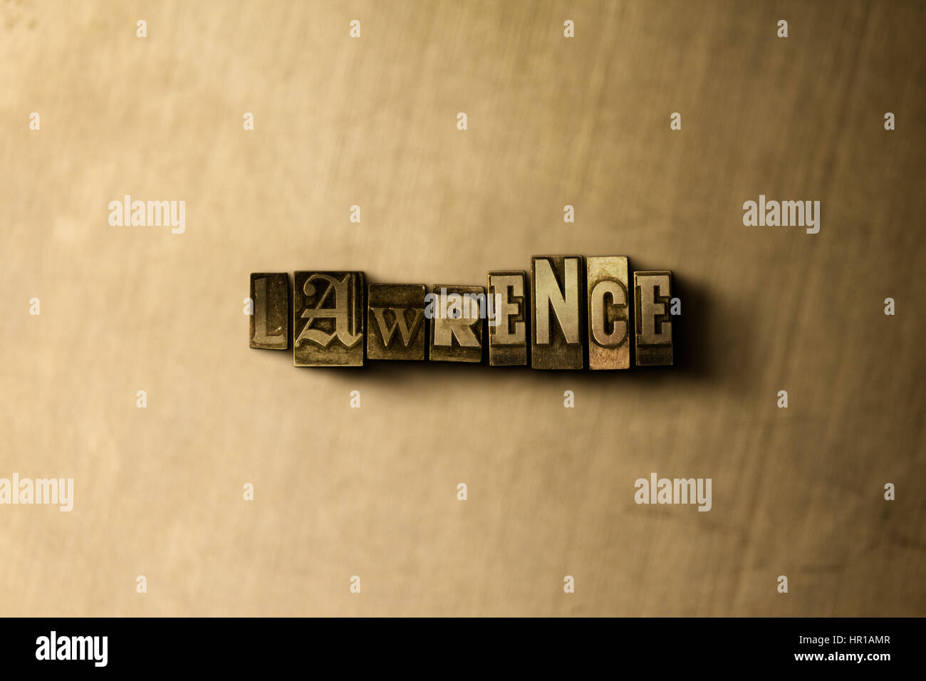 LAWRENCE - close-up of grungy vintage typeset word on metal backdrop ...