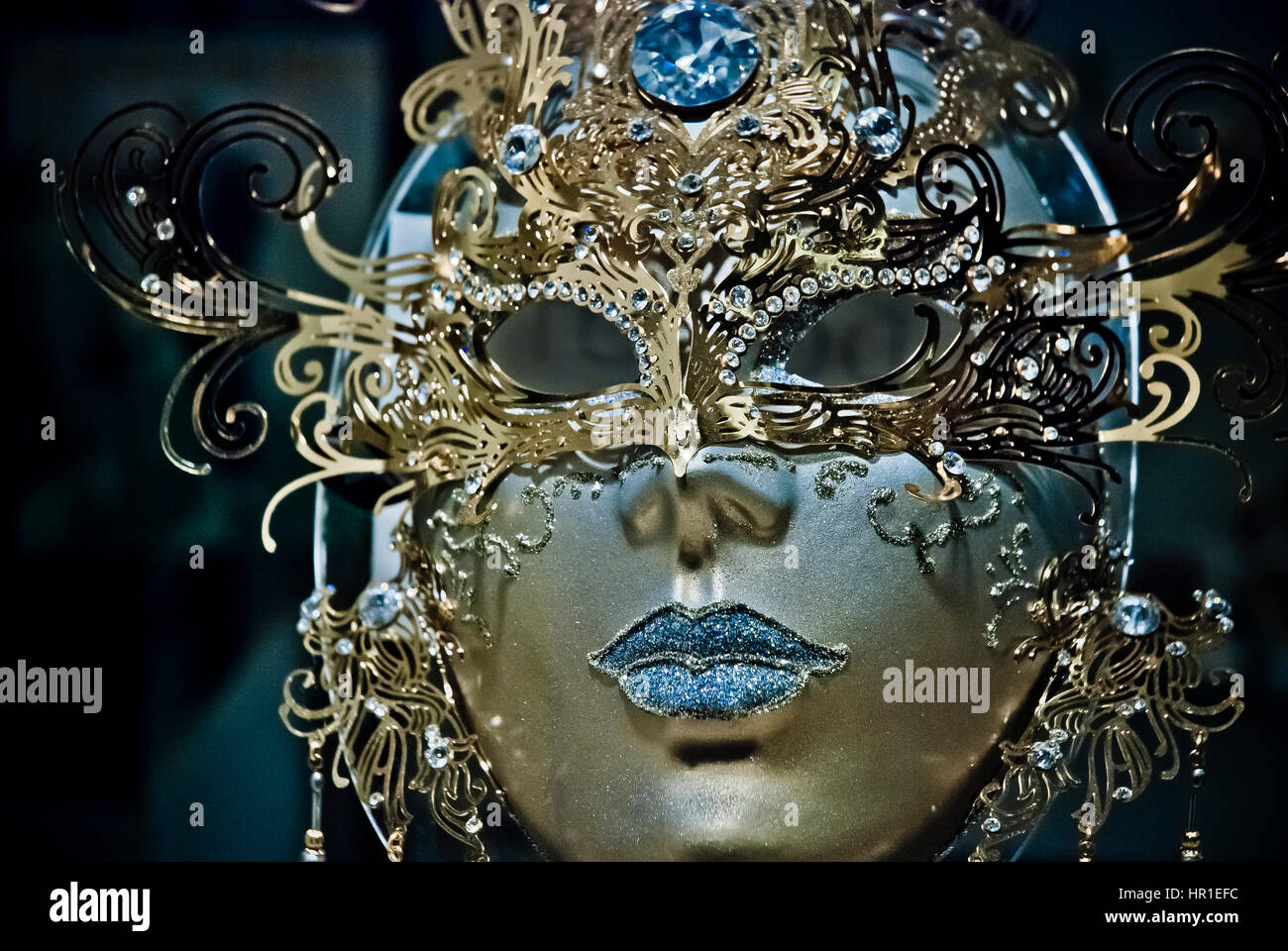 Venetian carnival mask displayed in a souvenir store window Stock Photo ...