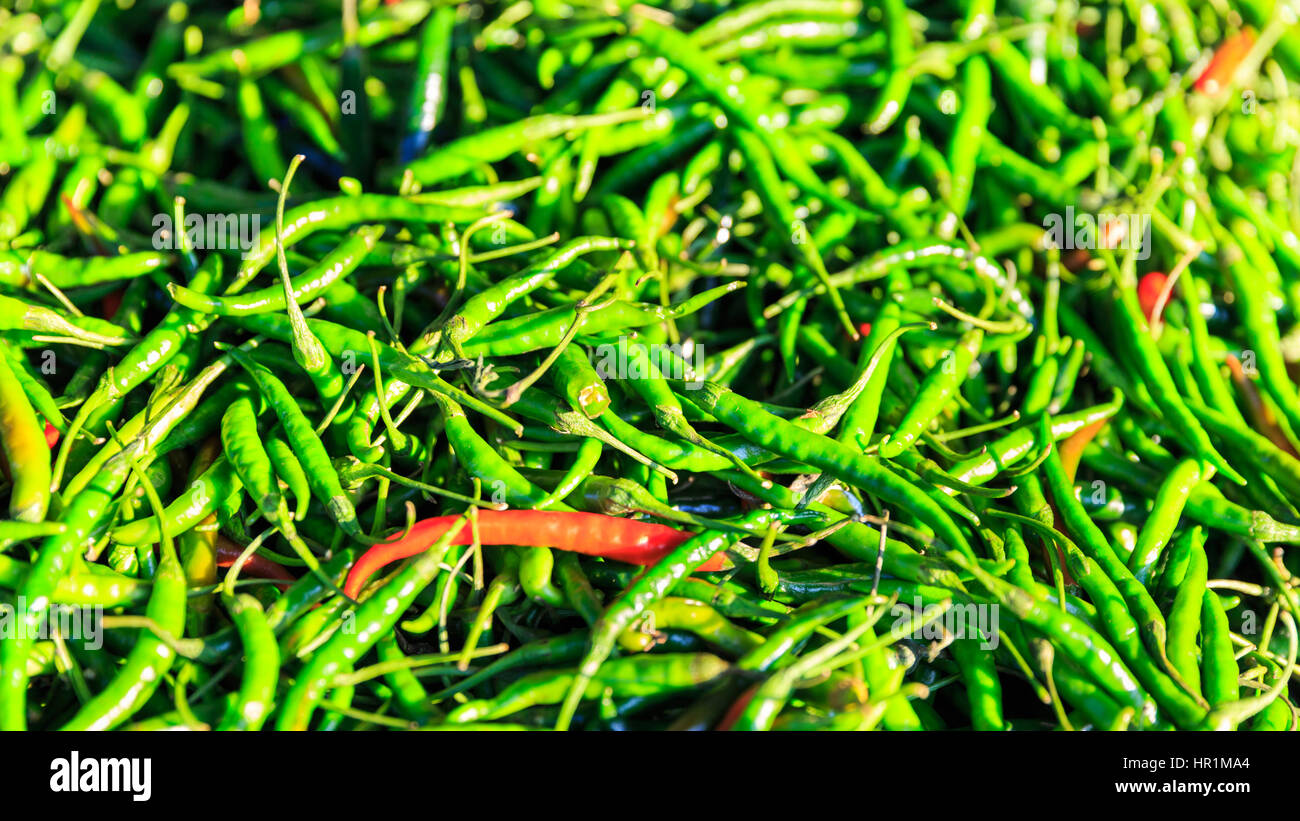 Lots of green chilies hi-res stock photography and images - Alamy