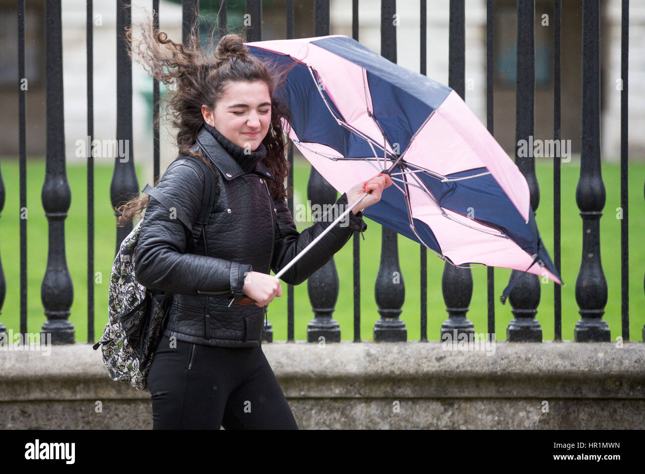 Tourists in cambridge in bad weather Stock Photo - Alamy