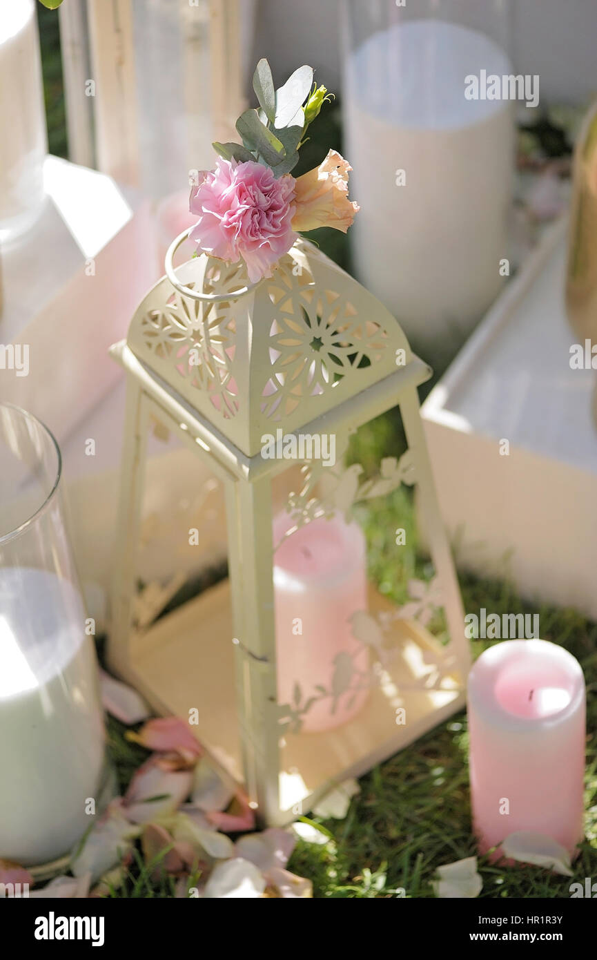 Beautifully composition of candles andred flowers Stock Photo - Alamy