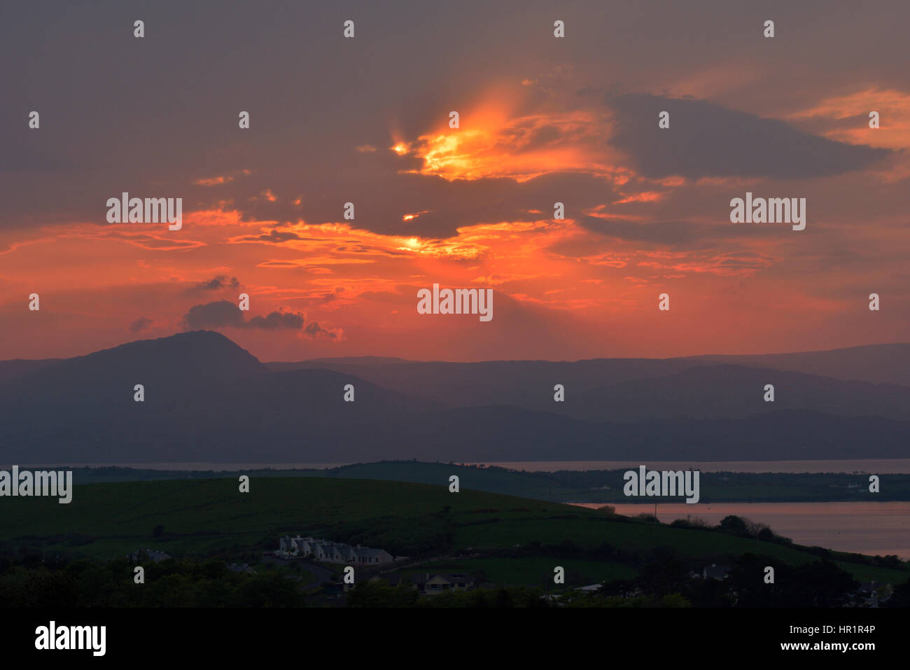 West Cork Sunset with the Sun Surprisingly High in the Sky Stock Photo ...