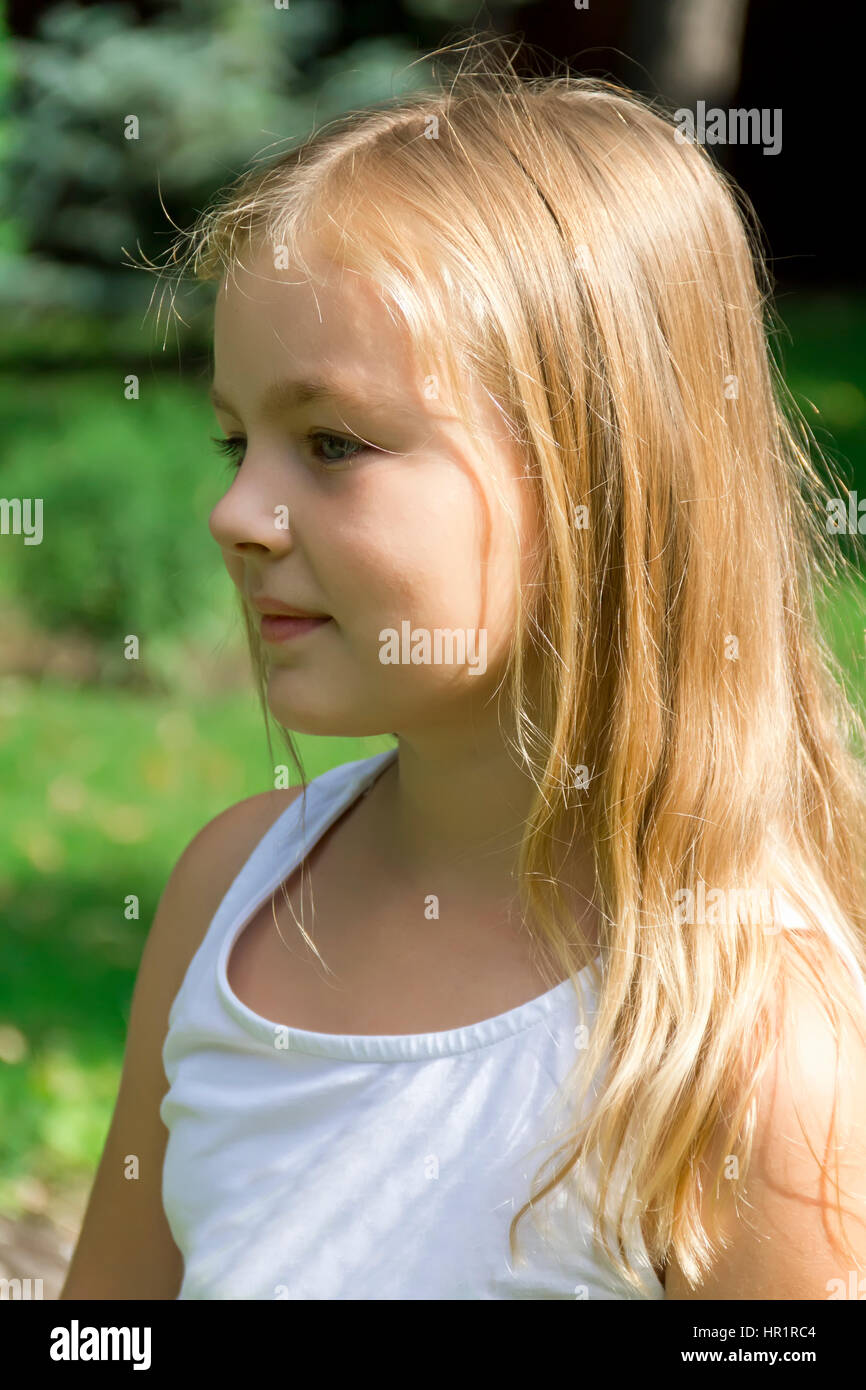 Portrait of cute girl with blond hair Stock Photo - Alamy