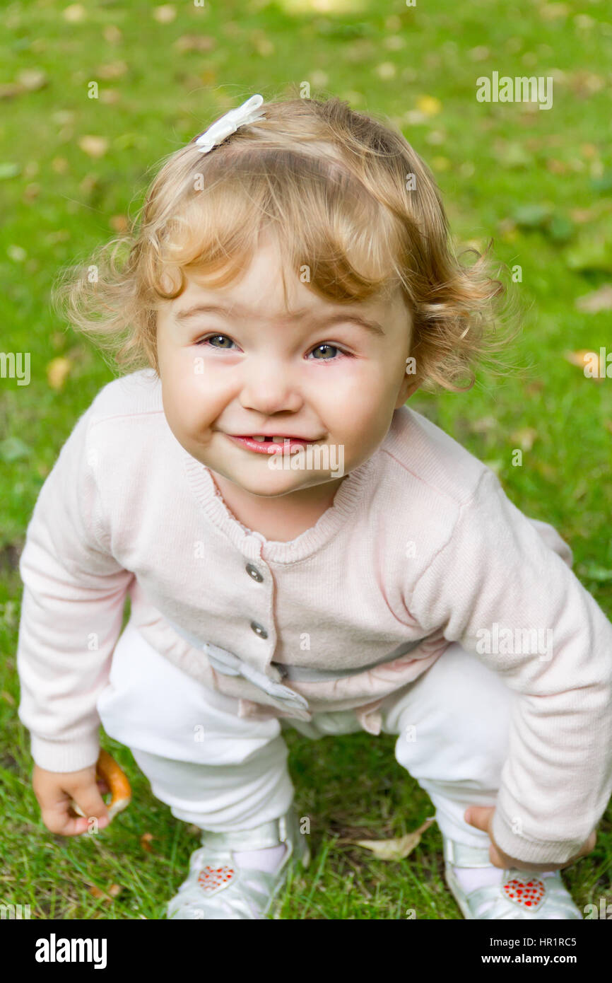 Photo of beautiful cute smiling infant girl Stock Photo - Alamy