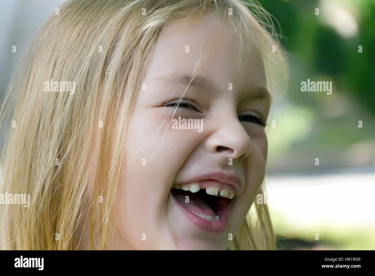 Portrait of cute smiling girl with blond hair Stock Photo - Alamy