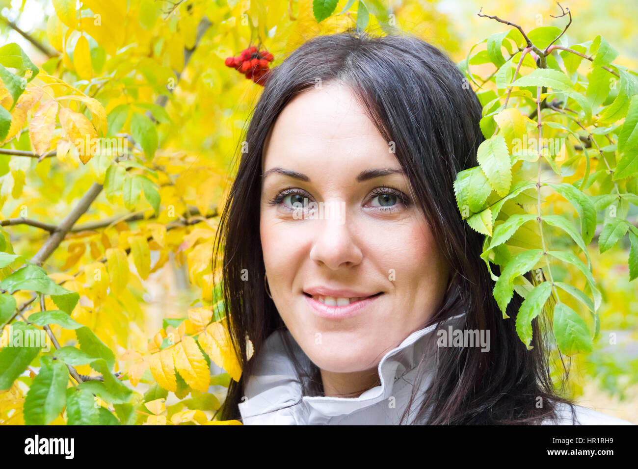 Photo of beautiful young brunette in autumn Stock Photo - Alamy