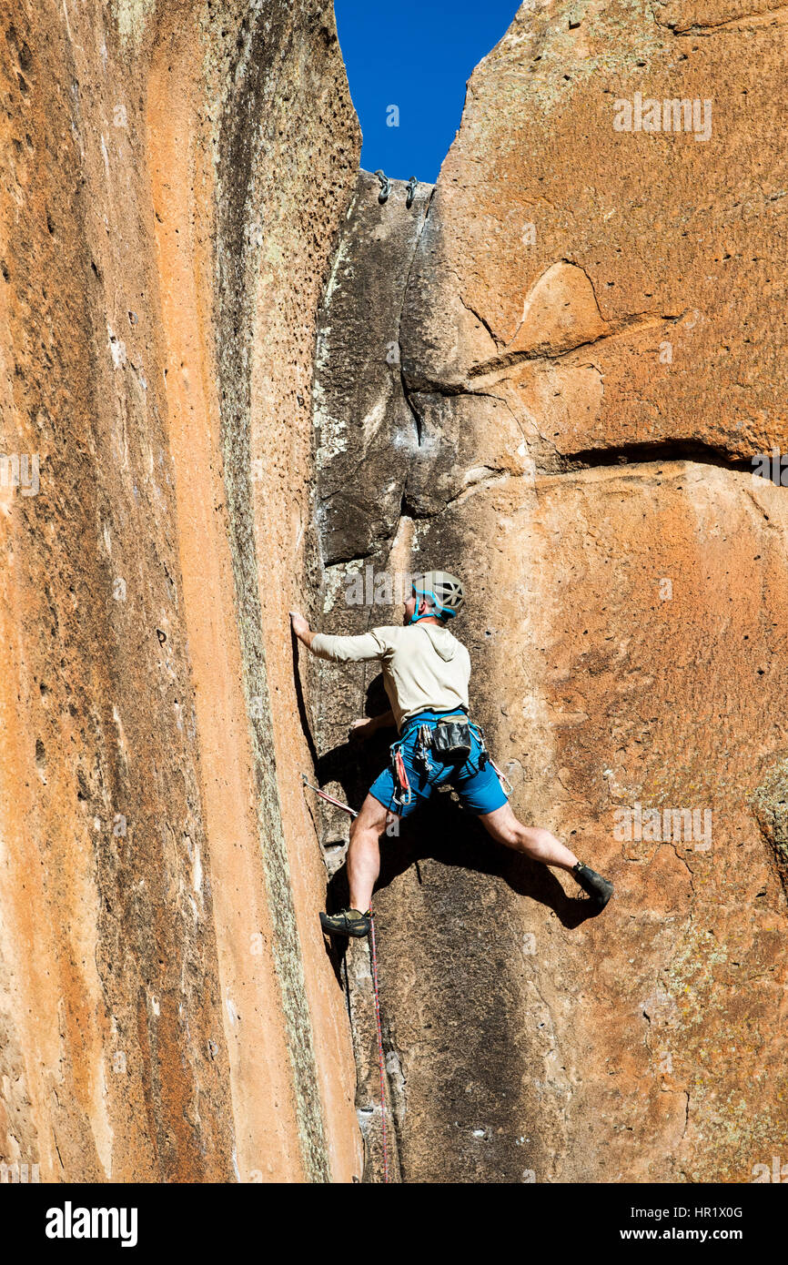 Young man rock climbing; Penitente Canyon; Colorado; USA Stock Photo ...