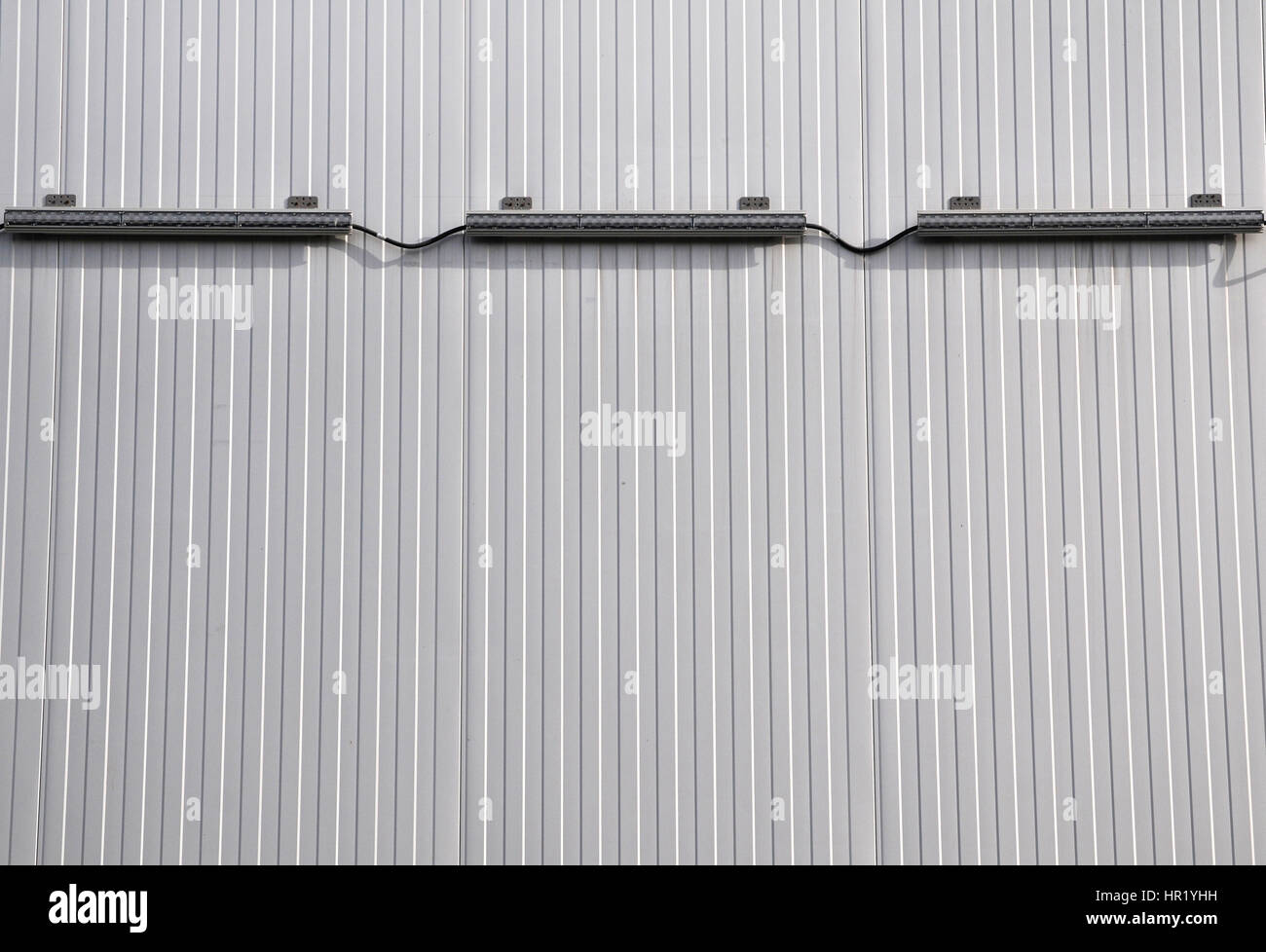 Sheet metal, corrugated wall building Stock Photo - Alamy