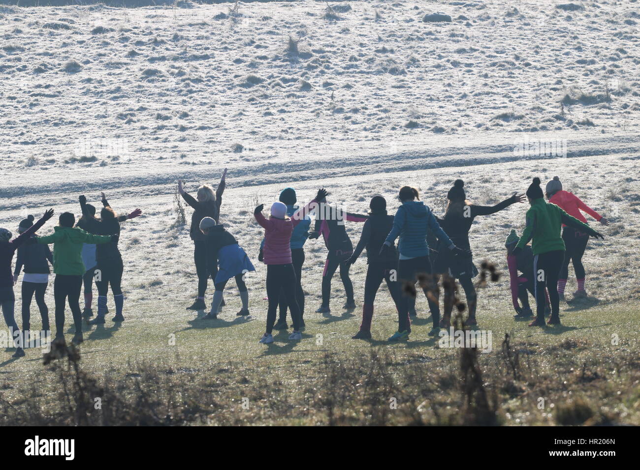 Women Excising up on Wittenham Clumps, UK Stock Photo - Alamy