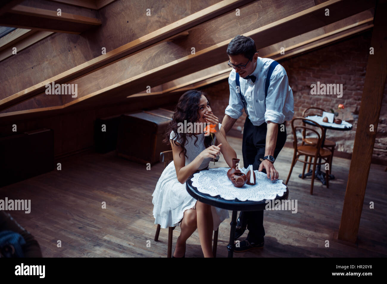 Happy romantic couple in love bonding in cafe Stock Photo - Alamy
