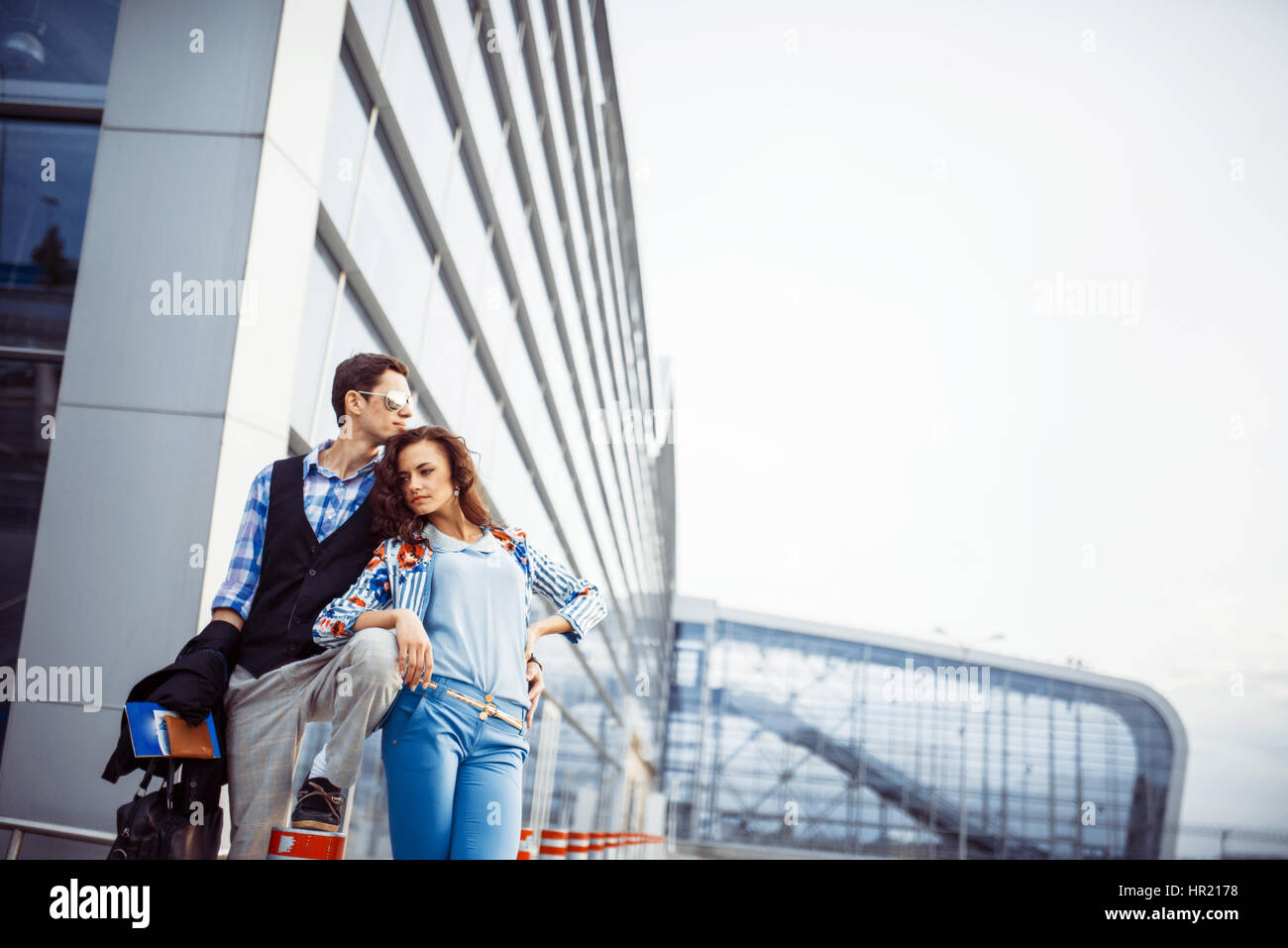Two happy people at the airport Terminal Stock Photo - Alamy
