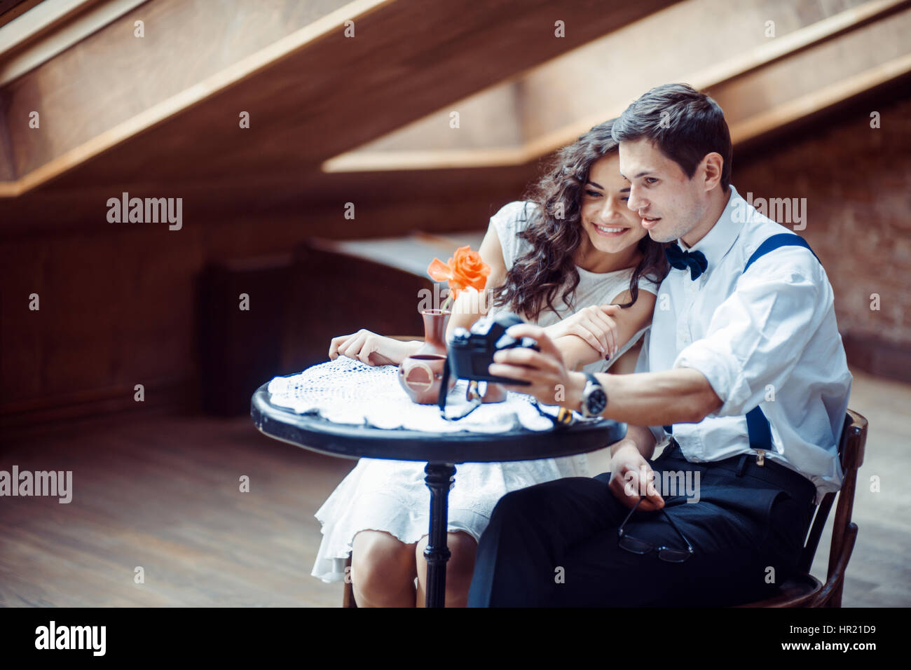 Happy romantic couple in love bonding in cafe Stock Photo - Alamy