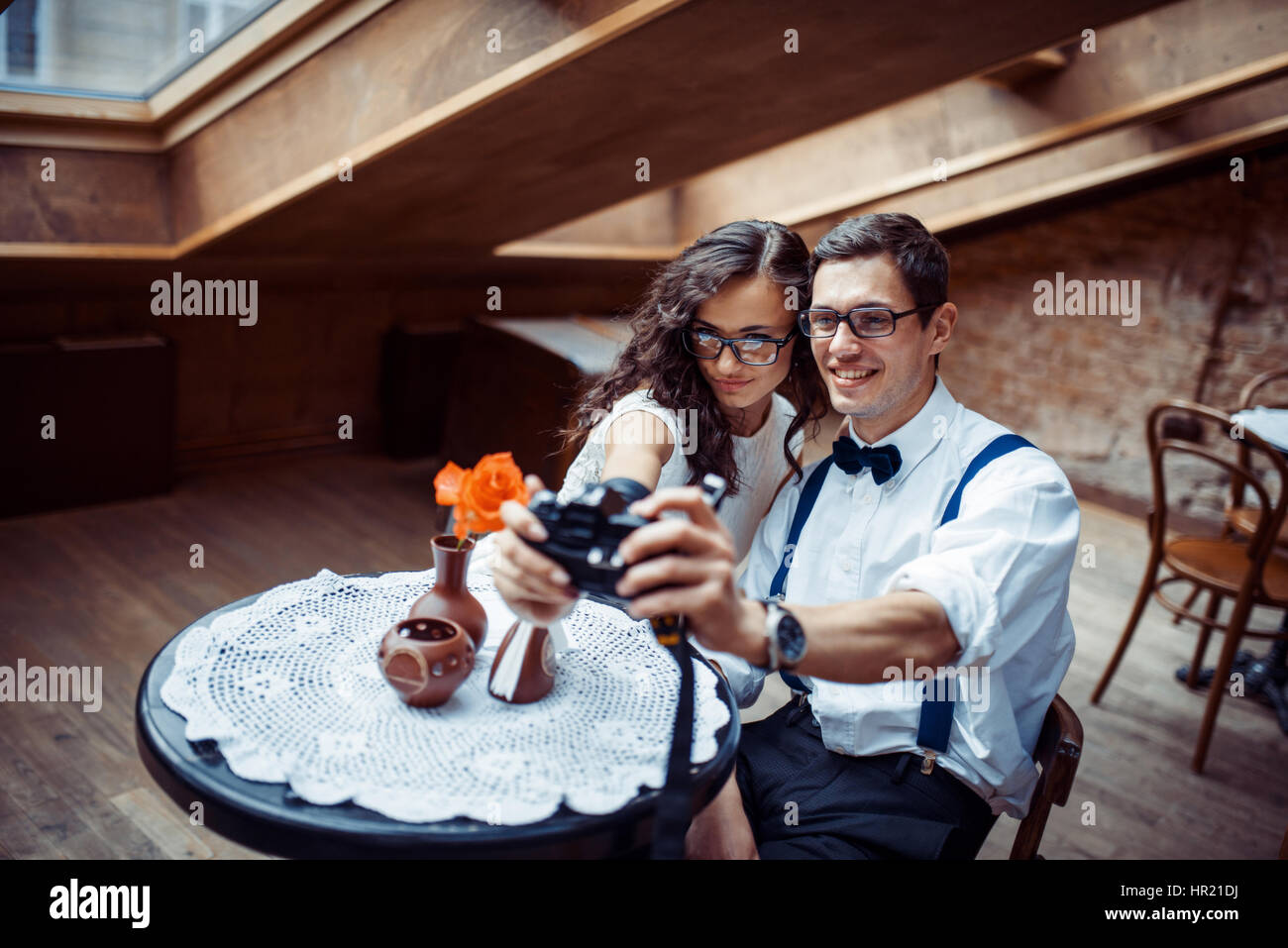 Happy romantic couple in love bonding in cafe Stock Photo - Alamy
