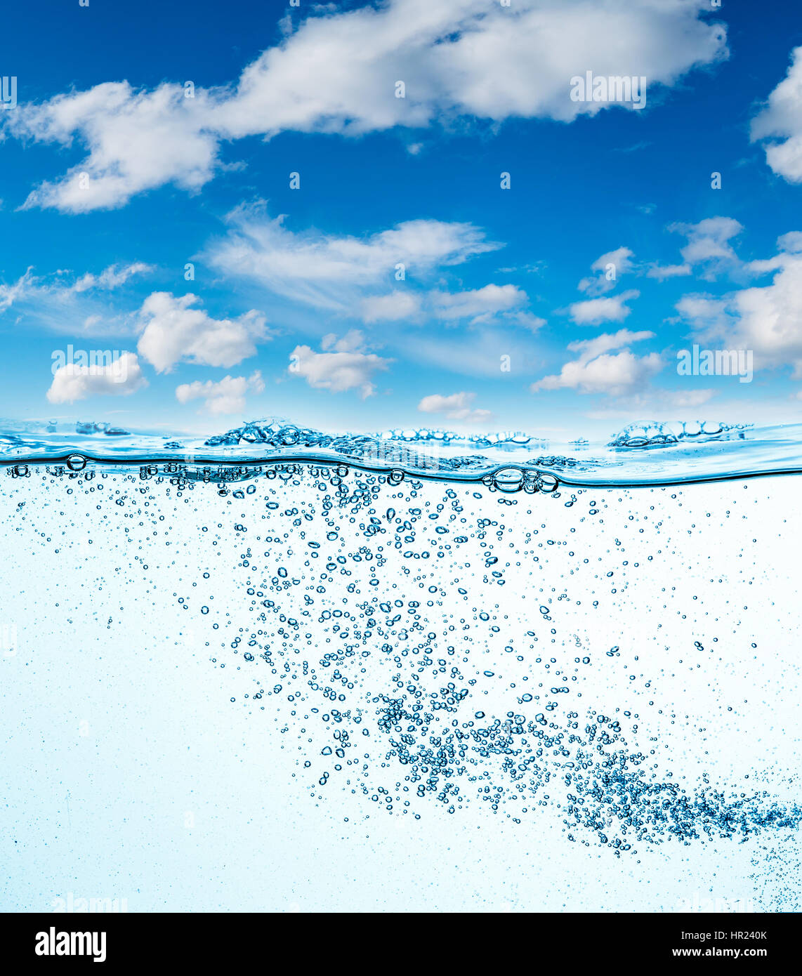 Many air bubbles in water close up, abstract water wave with bubbles on ...