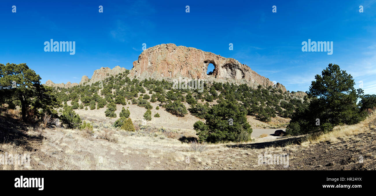 Wide panorama view of Natural Arch rock formation near Penitente Canyon ...