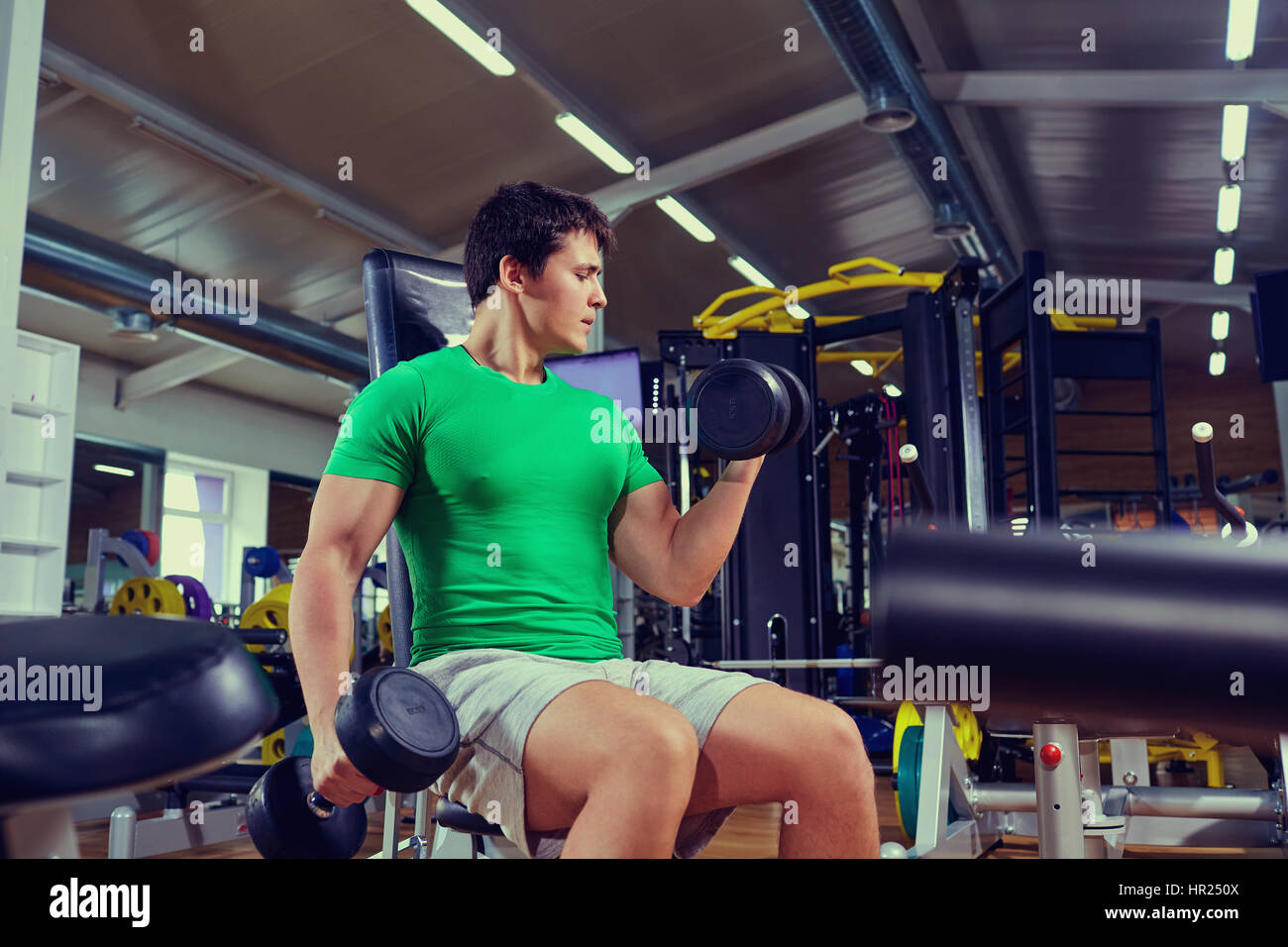 Dumbbell lifts hi-res stock photography and images - Alamy