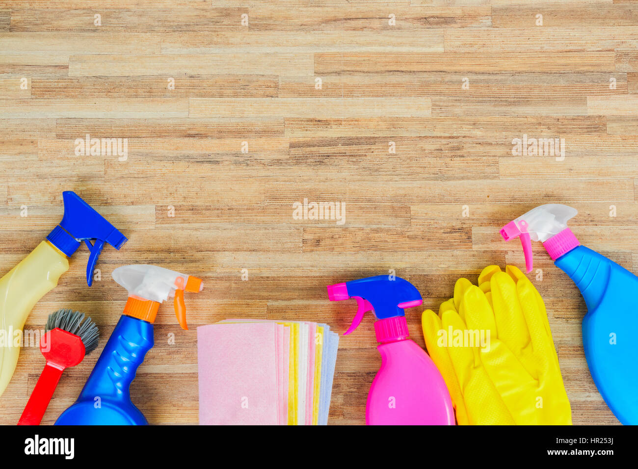 Spring cleaning concept - colorful spays and rubbers border Stock Photo ...