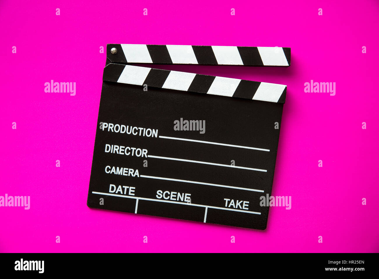 The vintage clapperboard on pink background. Top view Stock Photo - Alamy