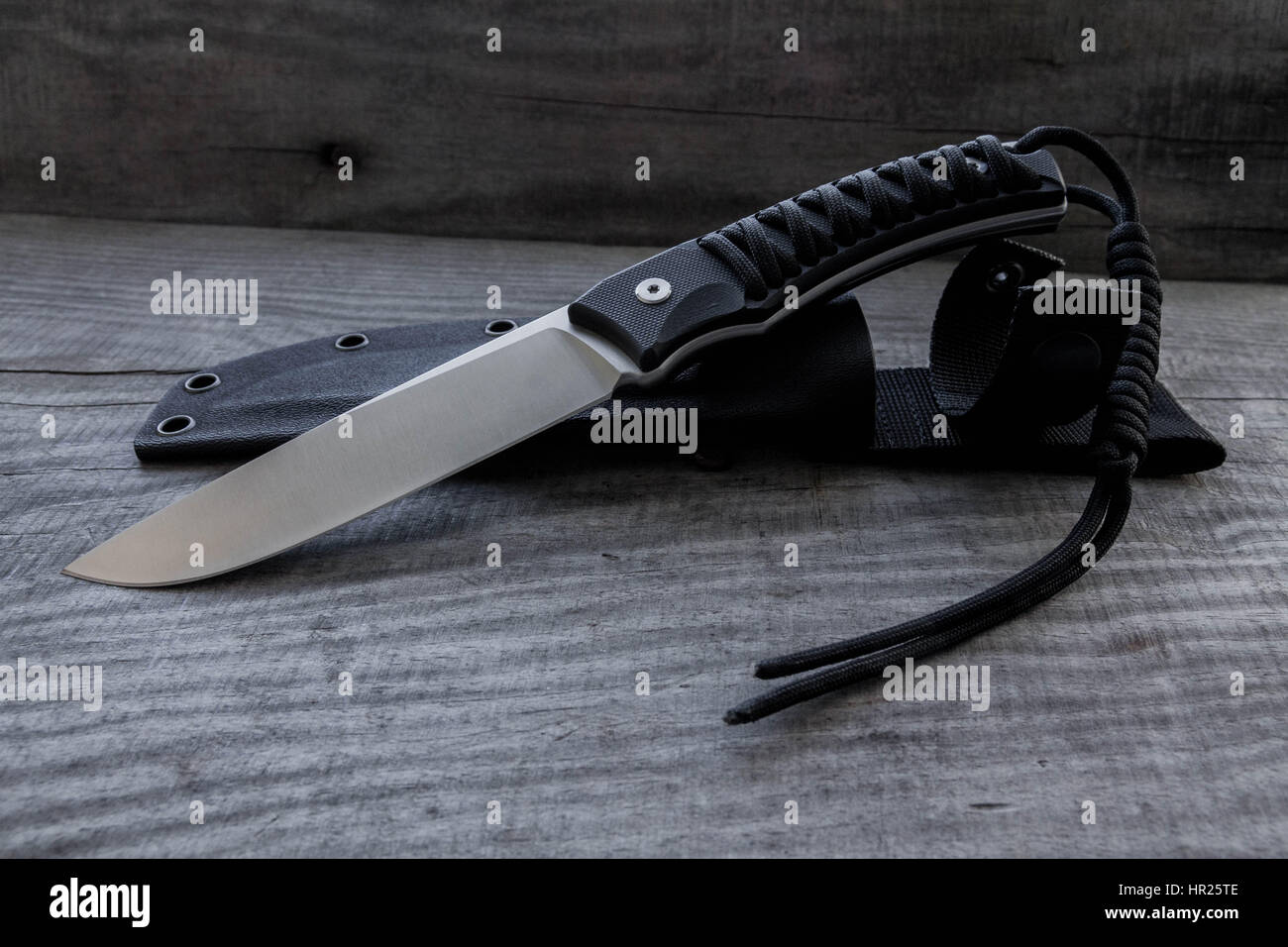 Hunting knife with cover. Center position. Front view Stock Photo - Alamy