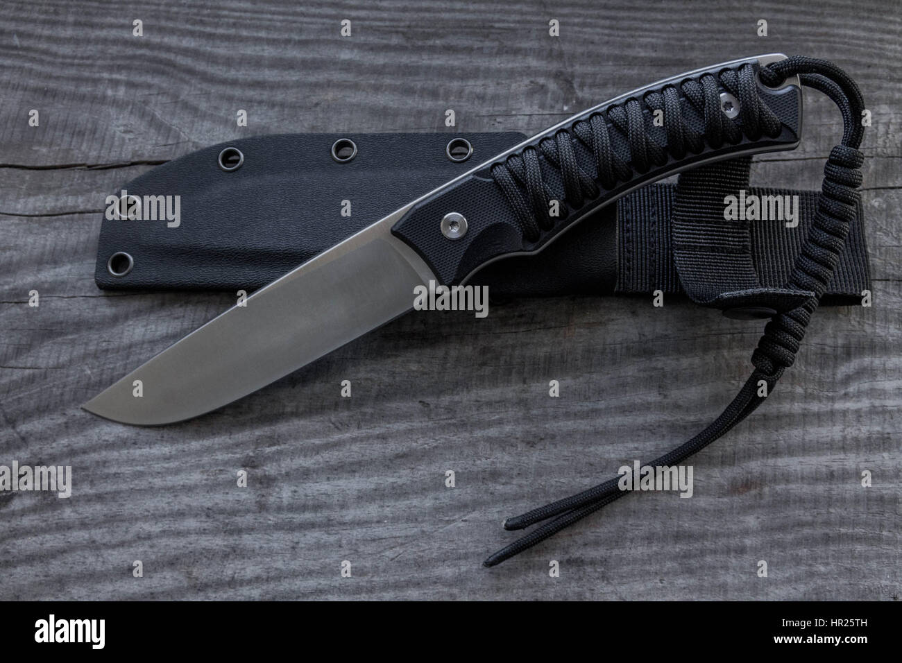 Hunting knife with cover. Center position. Top view Stock Photo - Alamy