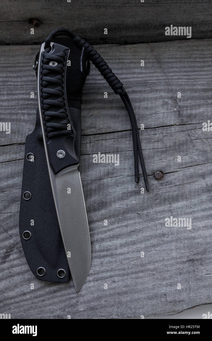 Hunting knife with cover. Left position. Top view Stock Photo - Alamy