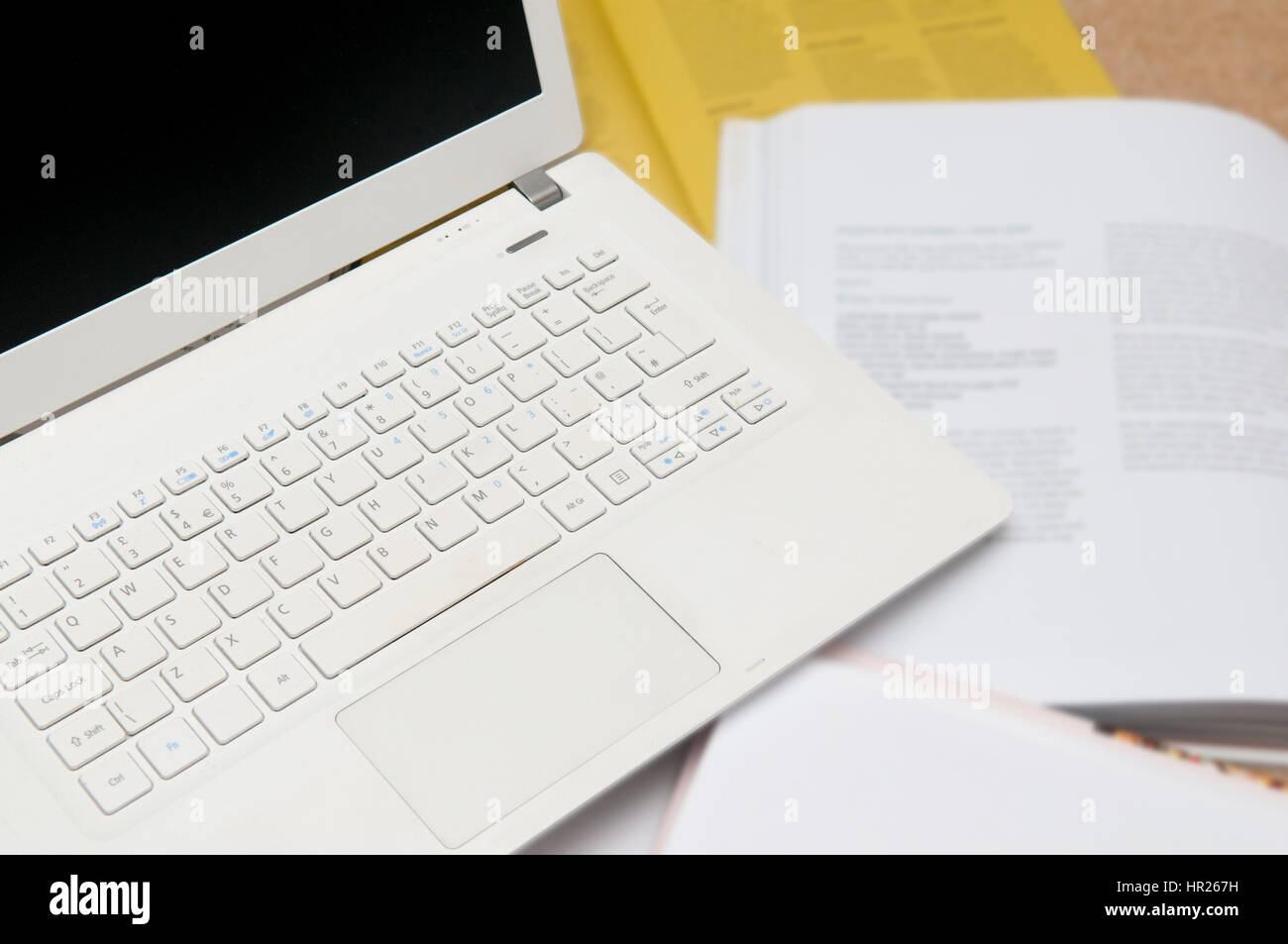 Education and business learning, laptop with books Stock Photo - Alamy