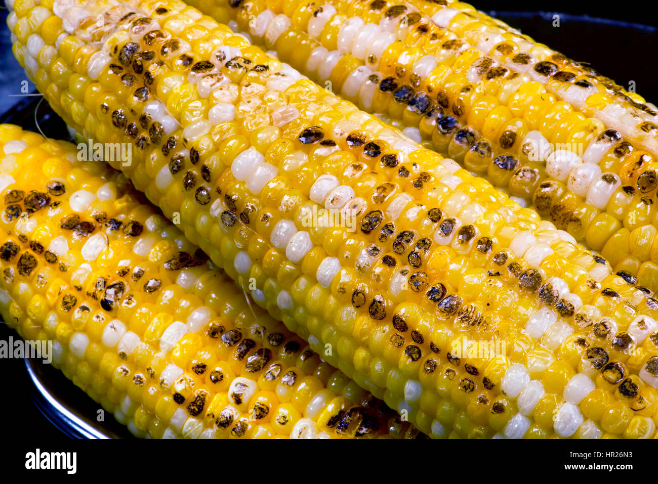 Closeup of buttered yellow grilled corn on the cob Stock Photo - Alamy