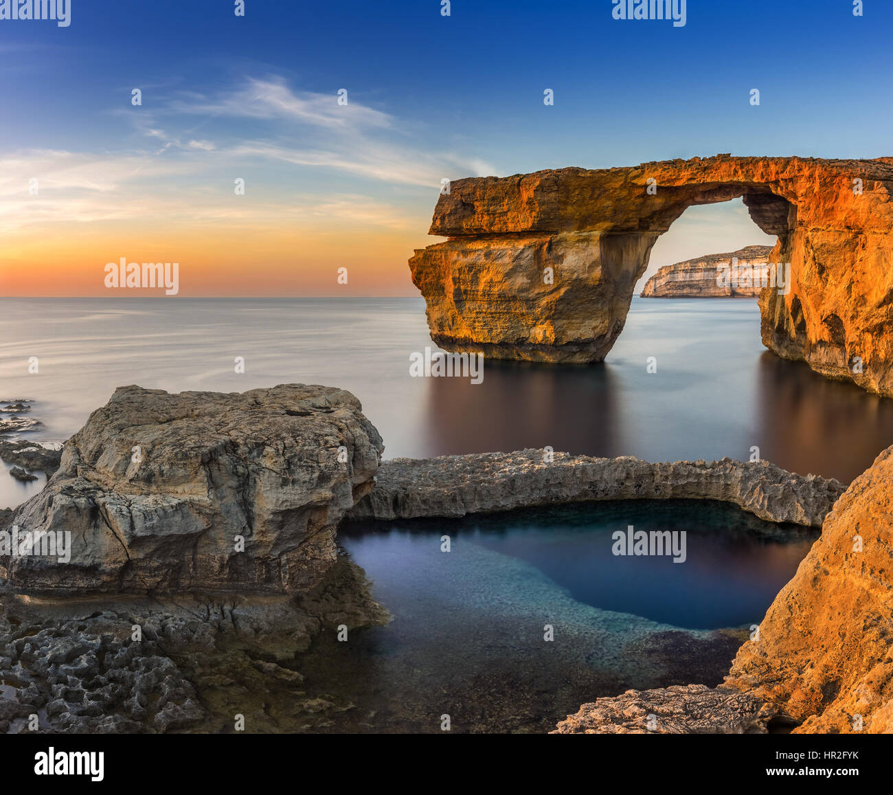 Gozo, Malta - Sunset at the beautiful Azure Window, a natural arch and ...