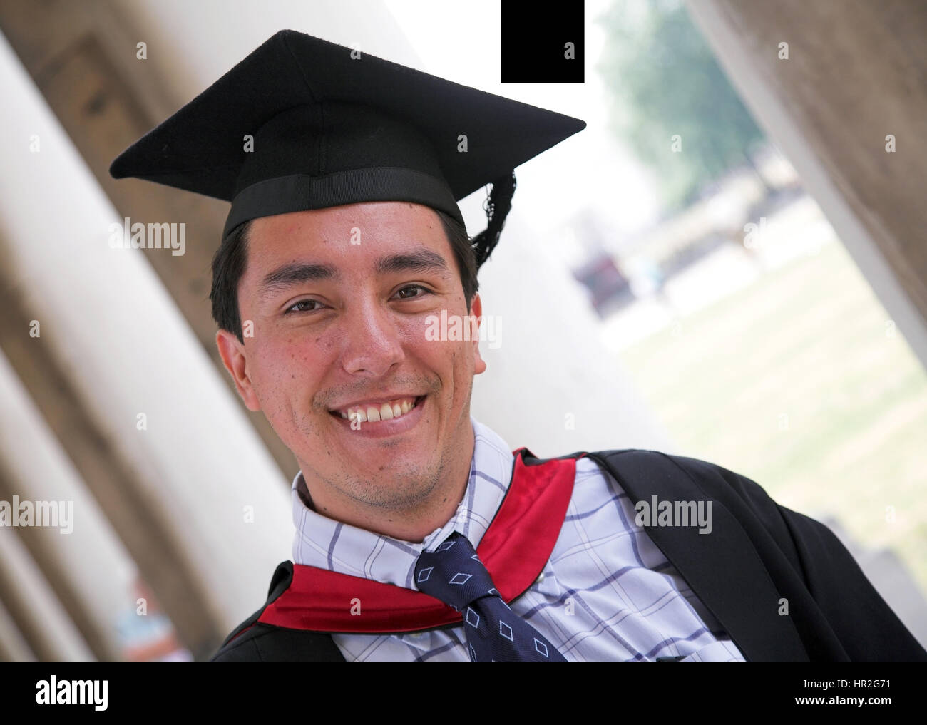 Smiling face male university graduate hi-res stock photography and ...