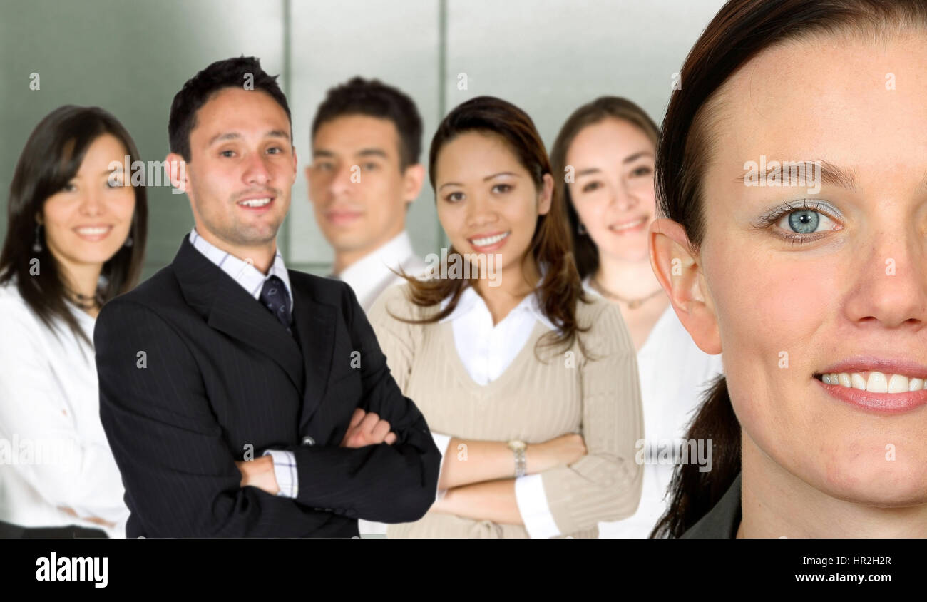beautiful business woman and her team in an office Stock Photo - Alamy