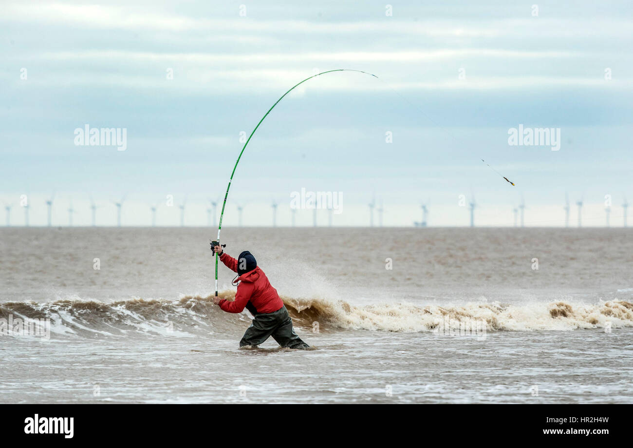 An angler competes in the Worldâ€™s largest beach angling festival on ...
