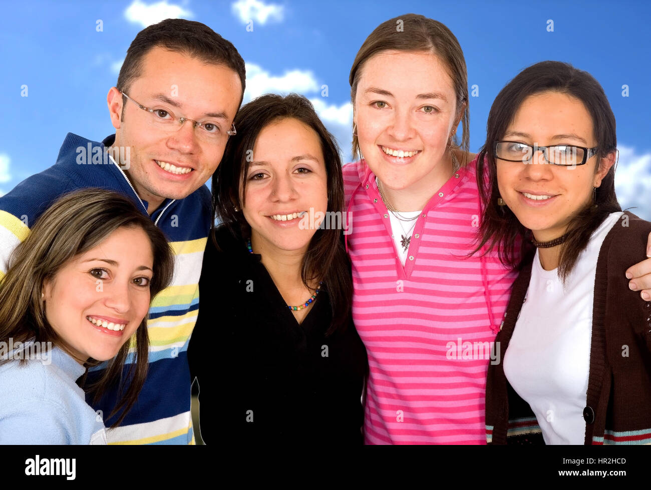 group of happy friends isolated over a white background Stock Photo - Alamy