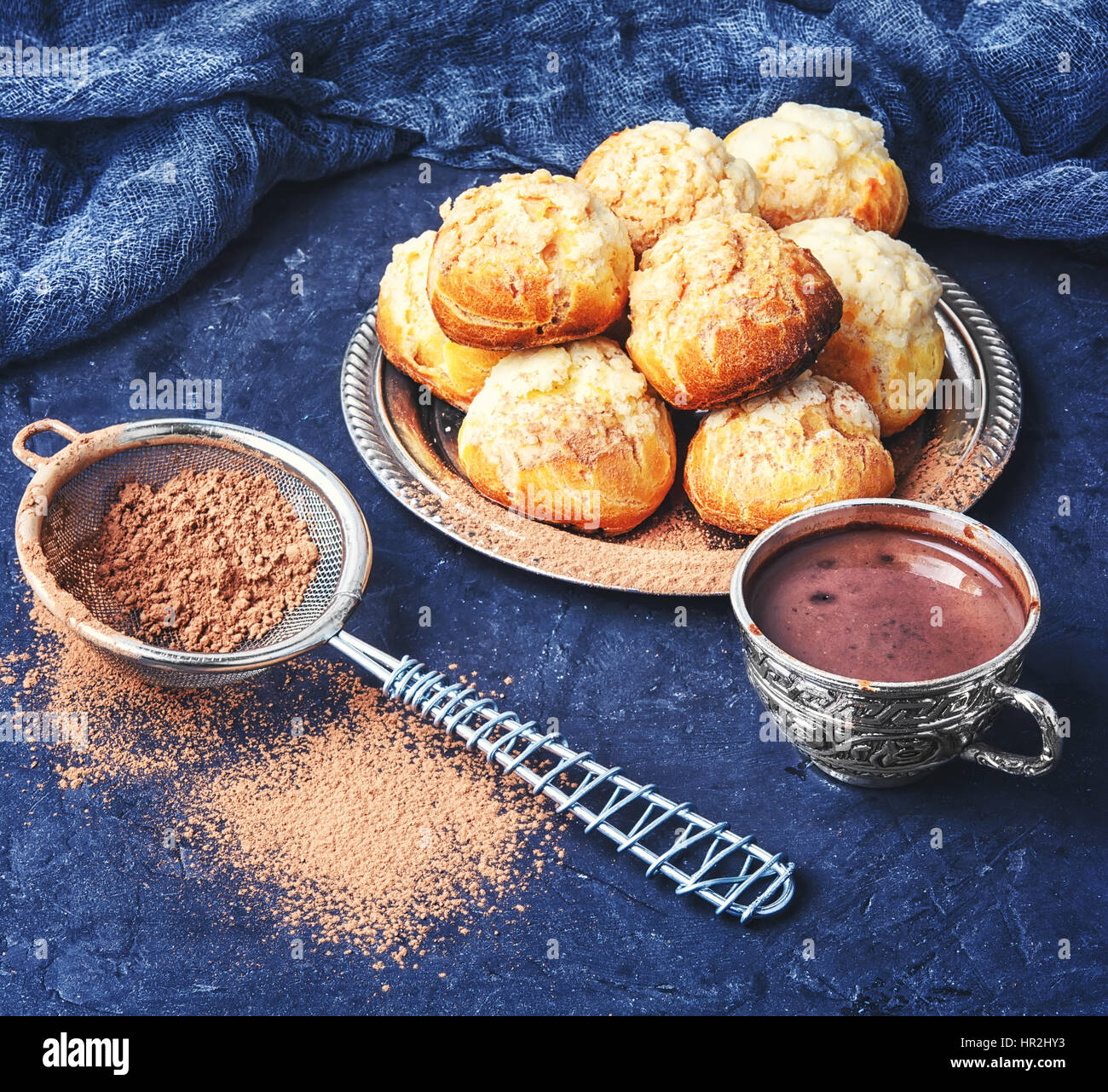Homemade profiteroles dessert and cup hot chocolate Stock Photo - Alamy