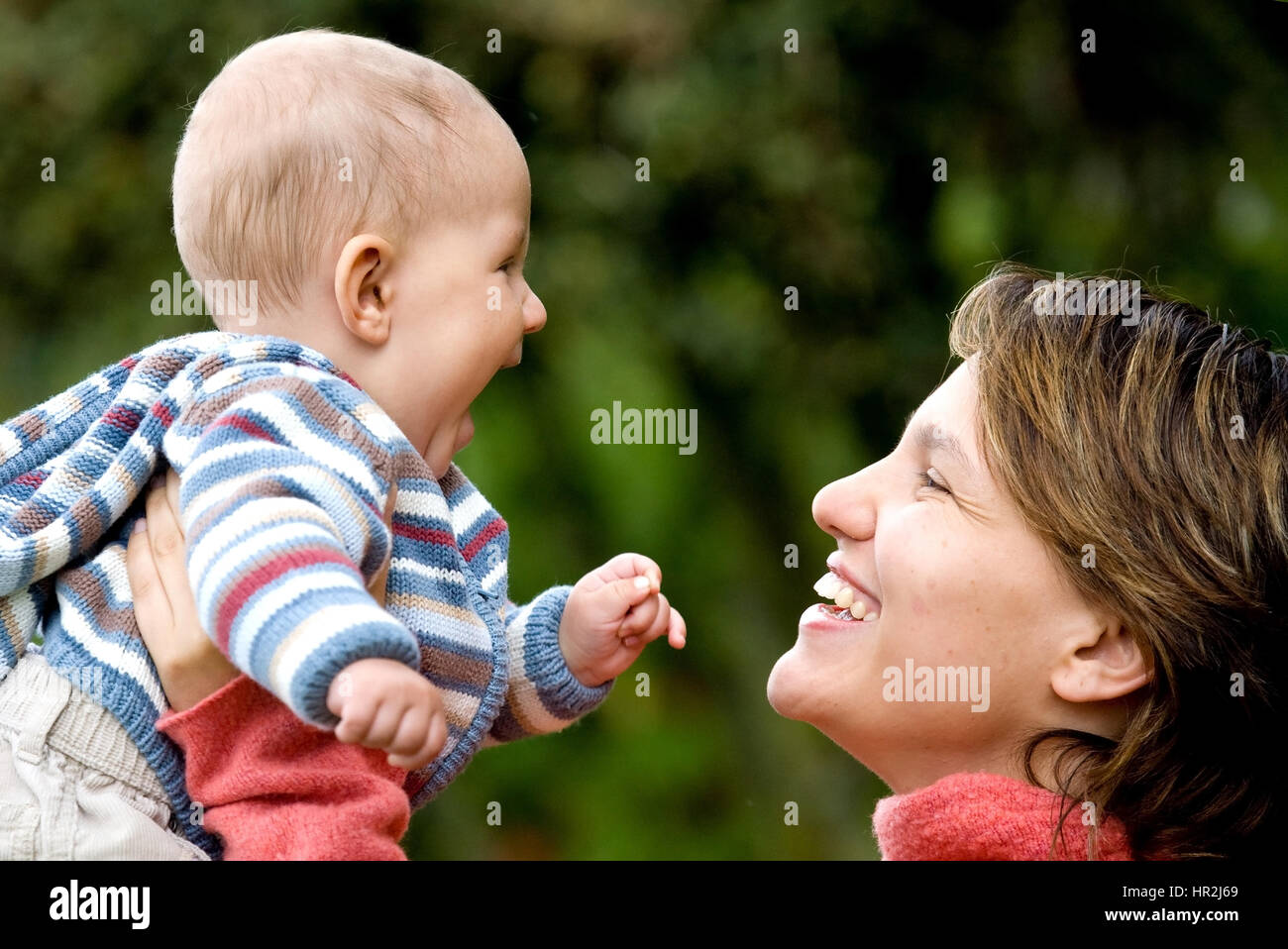 beautiful mother and son looking happy and smiling outdoors Stock Photo ...