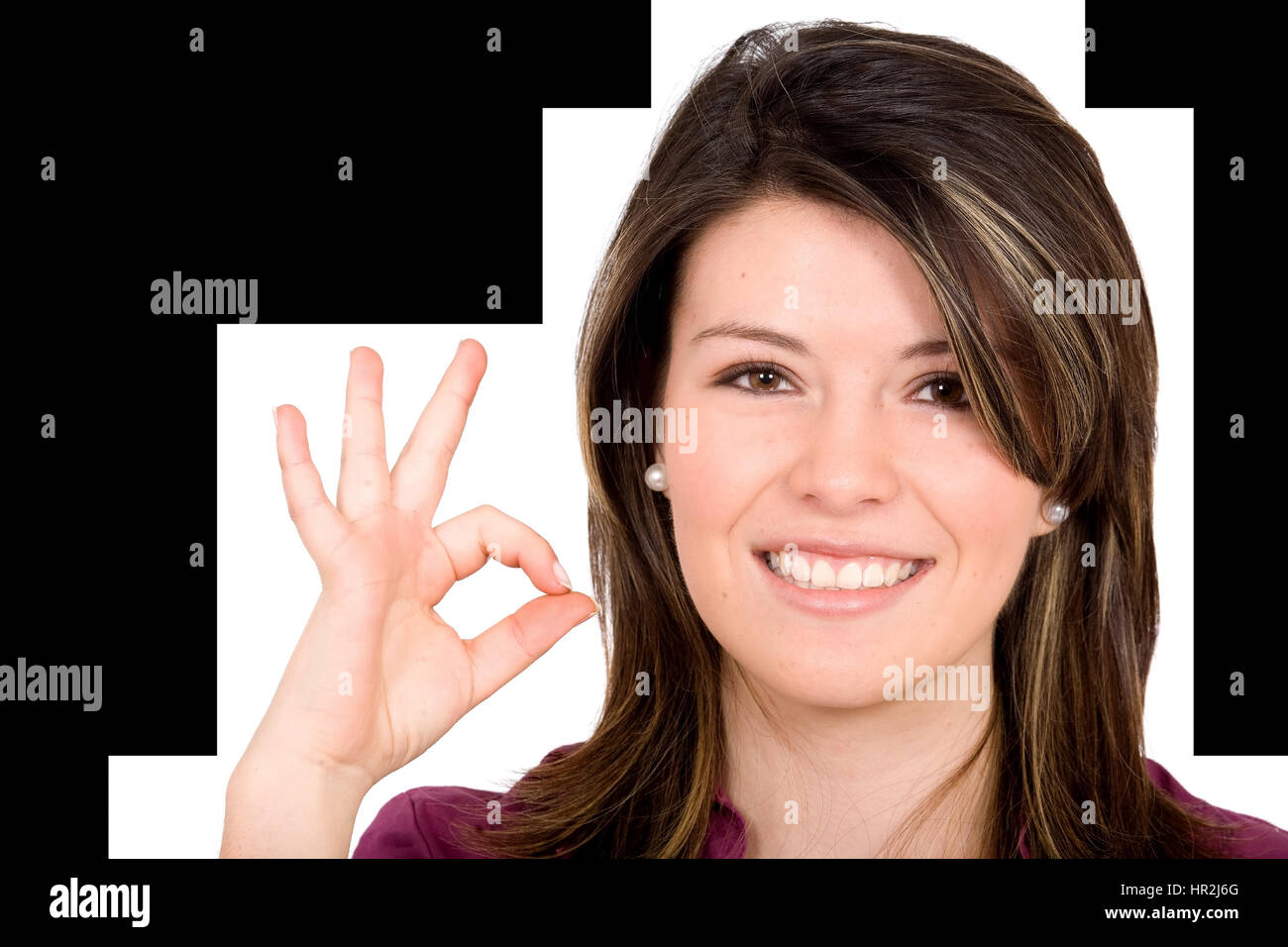 girl doing okay sign and smiling over a white background Stock Photo ...