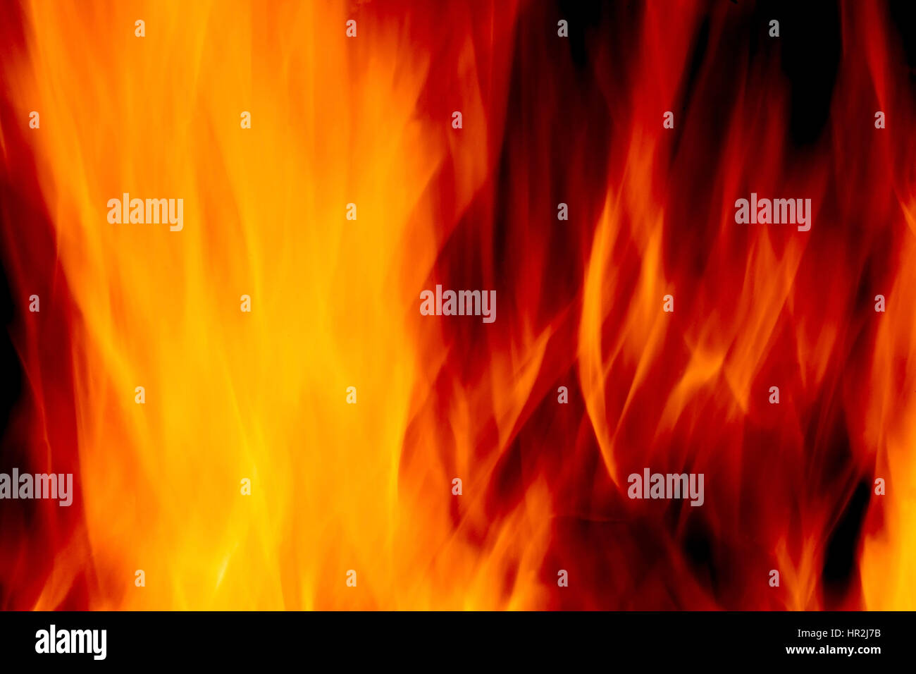 abstract blur of a fire over a black background Stock Photo - Alamy