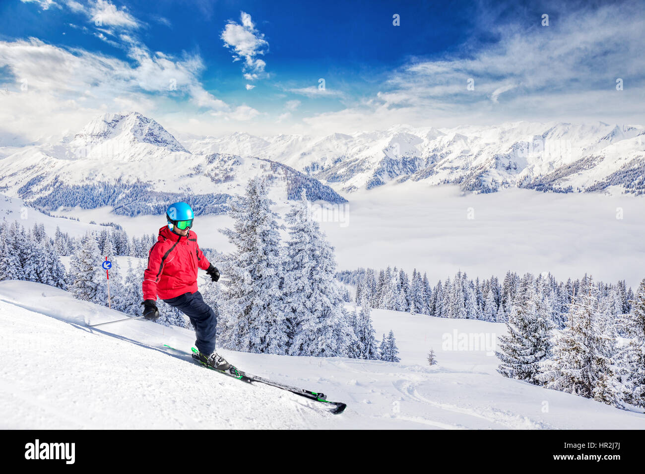 Skier on the slope in Kitzbuhel ski resort in Tyrolian Alps, Austria ...